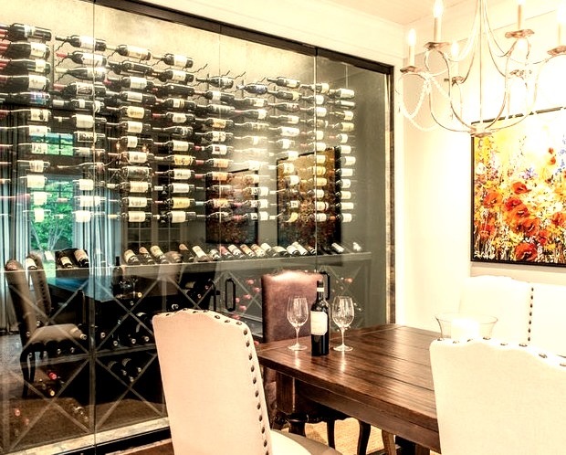 Example of a small eclectic ceramic tile wine cellar design with ...